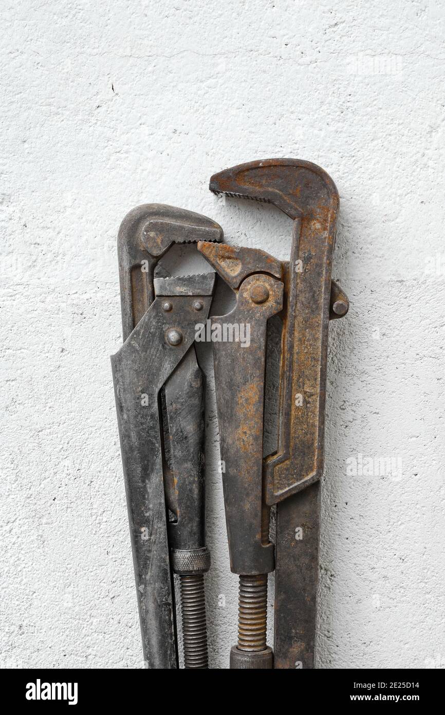 Old vintage rusty pipe wrench Stock Photo - Alamy