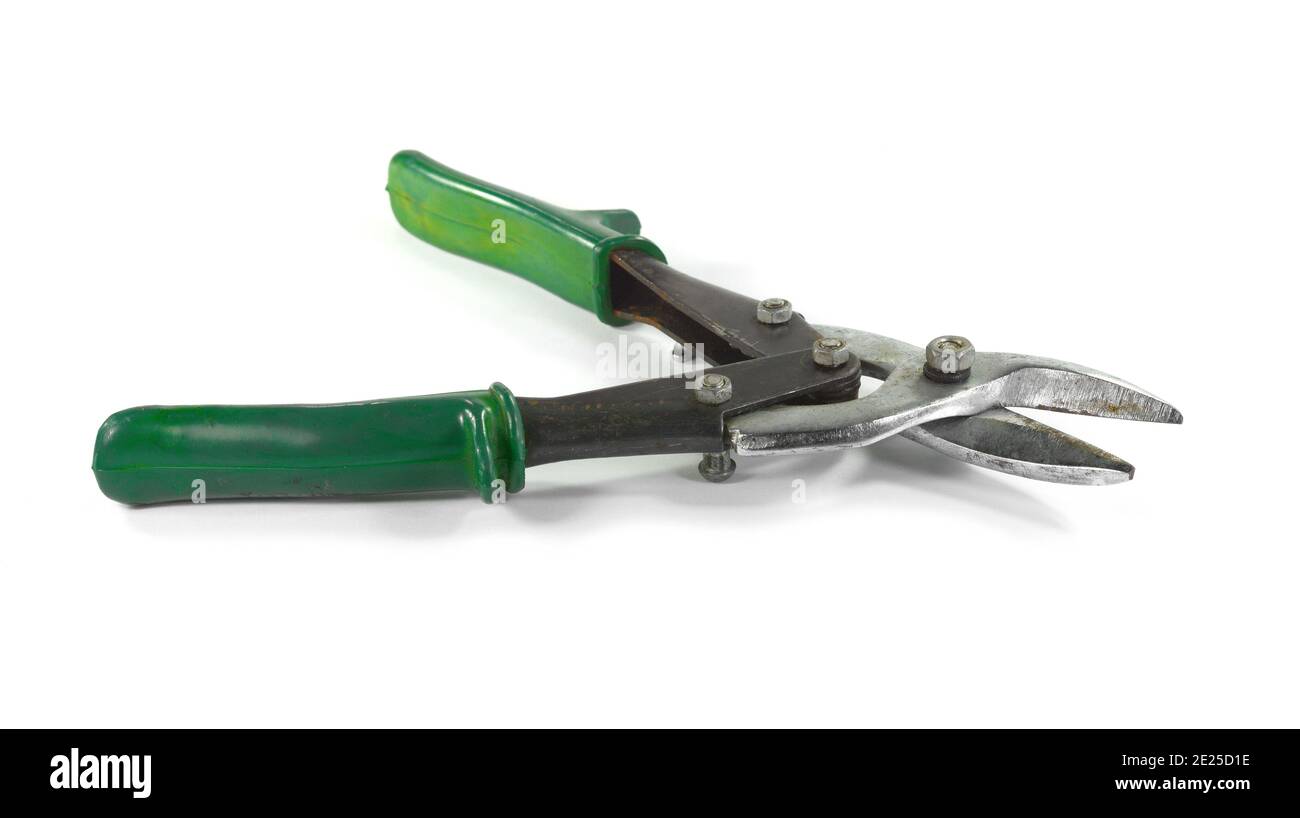 Used tin snips isolated on a white background Stock Photo - Alamy