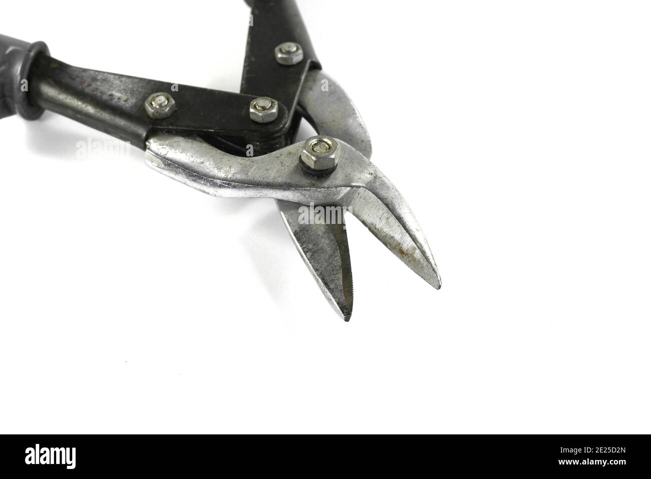 Used tin snips isolated on a white background Stock Photo - Alamy