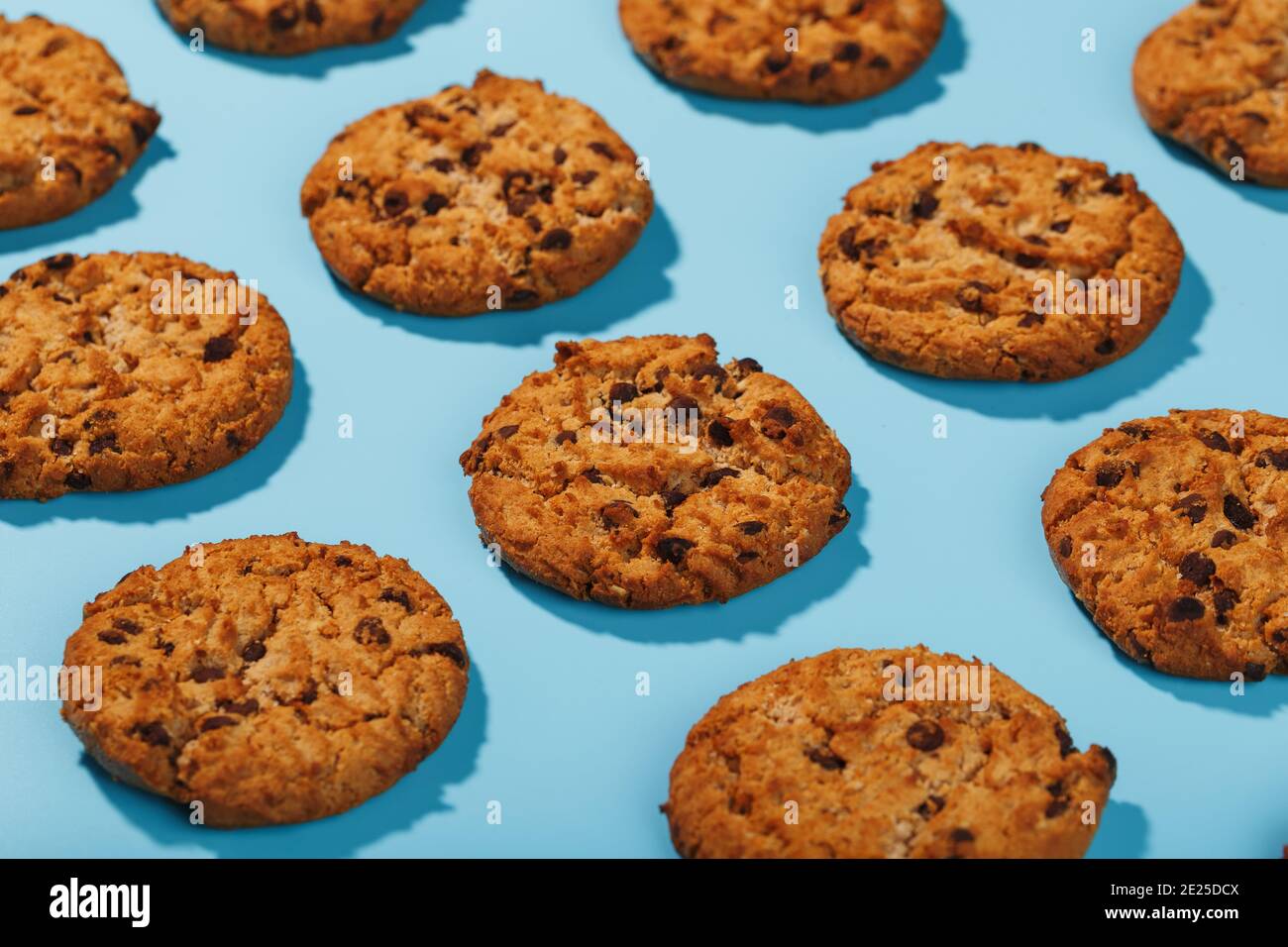 Oatmeal cookies with chocolate chip pattern and patterns on a light ...