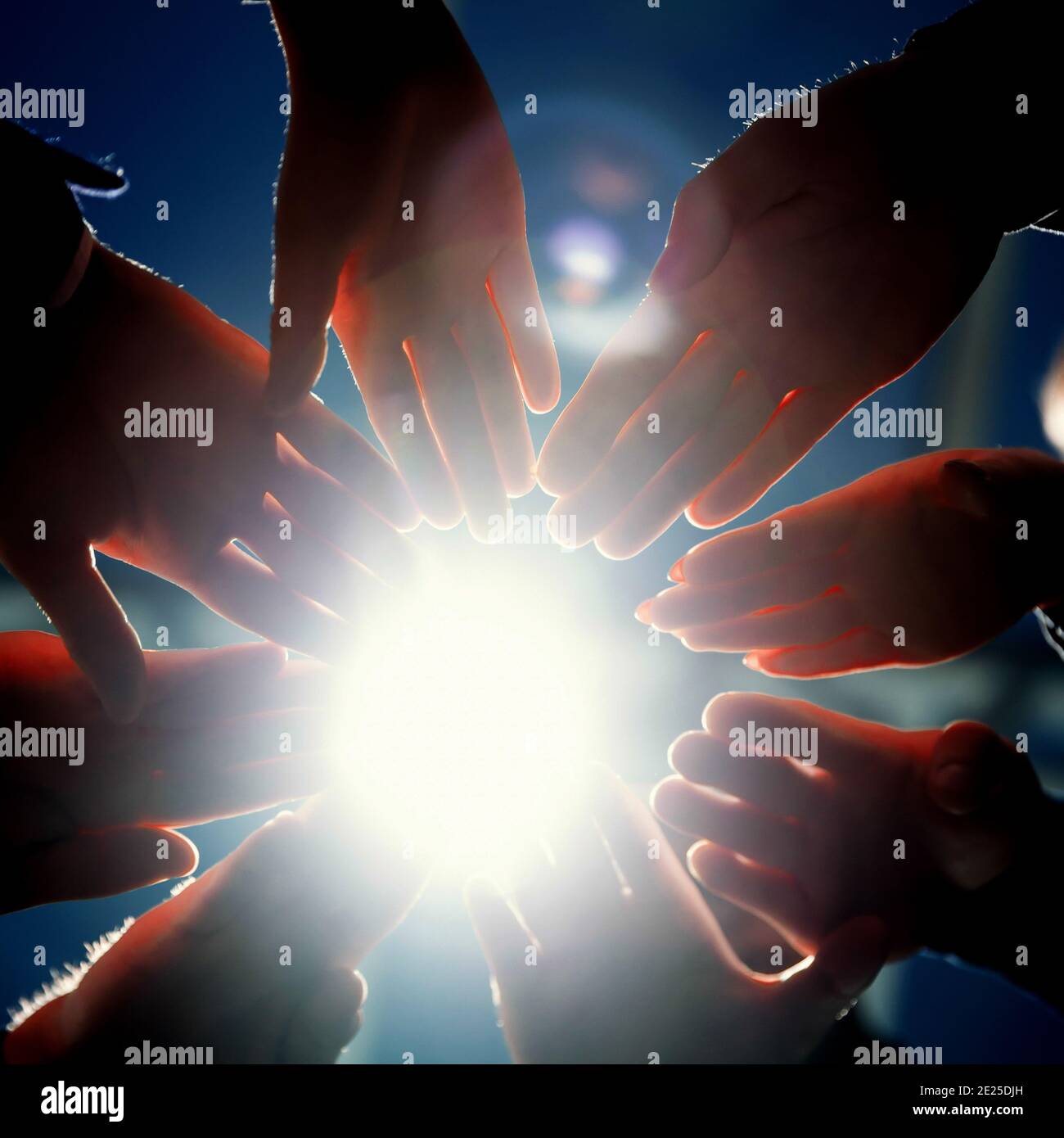 Business people joining hands in circle hi-res stock photography and ...