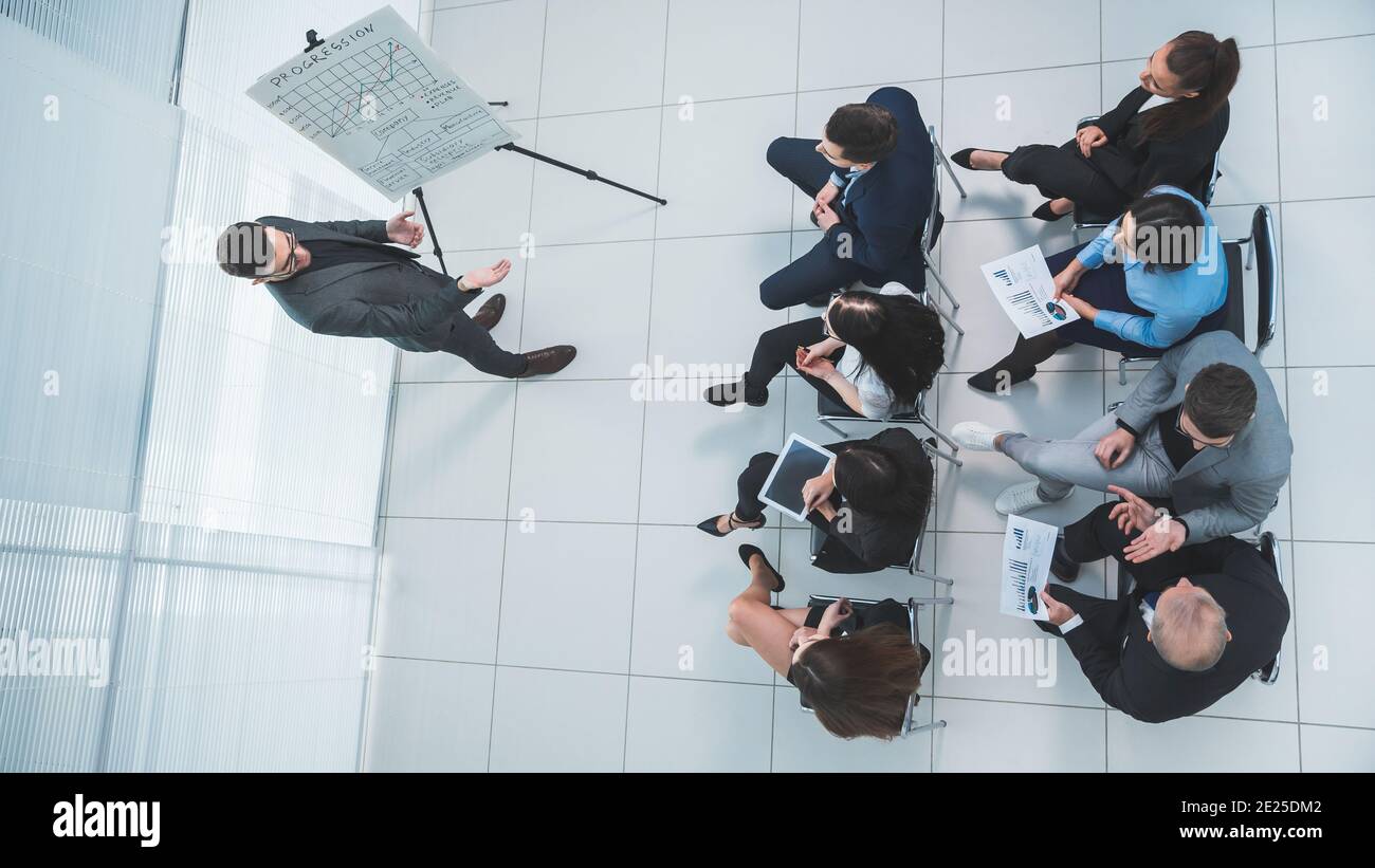 speaker asks questions during the business presentation Stock Photo - Alamy