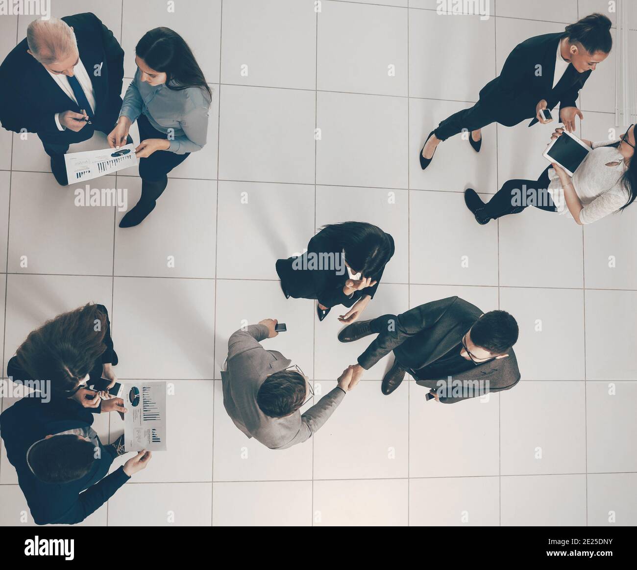Group employees analyzing documents data hi-res stock photography and ...