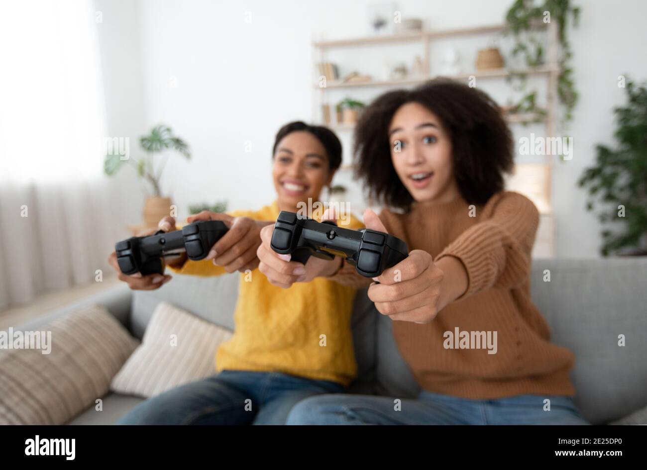 Xbox, enjoying of playing in video game on playstation and rest at home ...