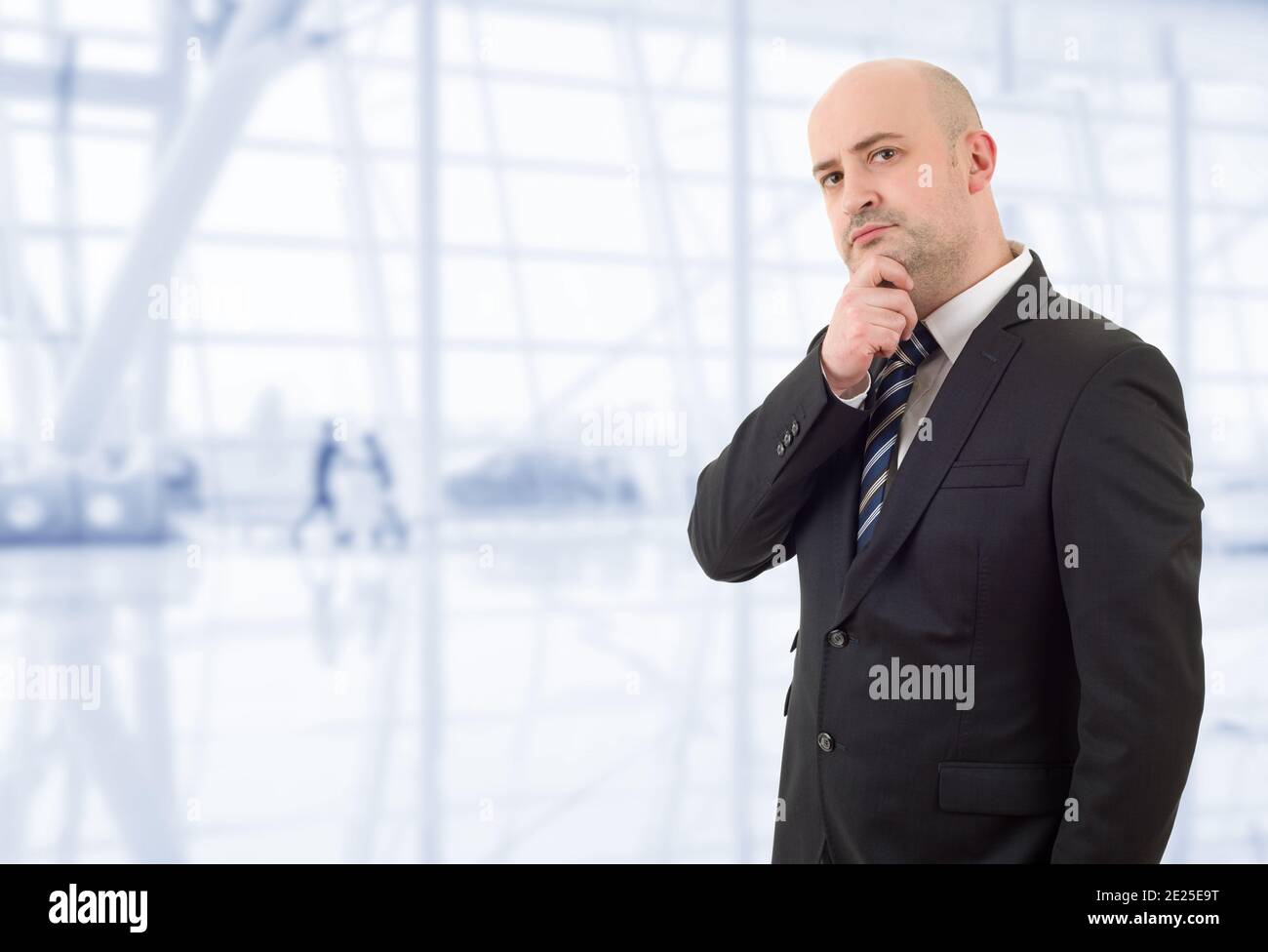 young business man thinking, at the office Stock Photo - Alamy
