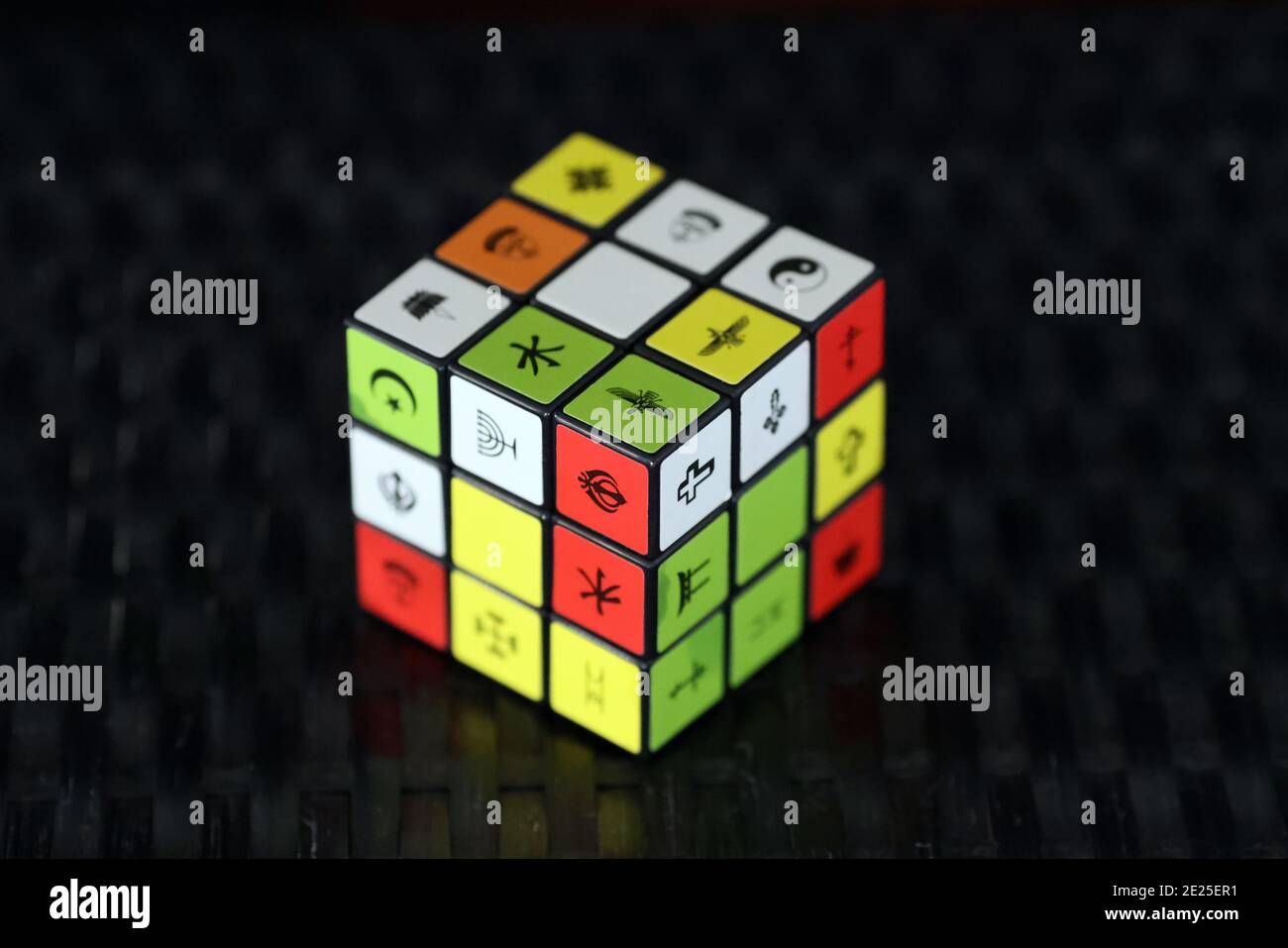 Rubik's cube with religious symbols. Interreligious and interfaith ...