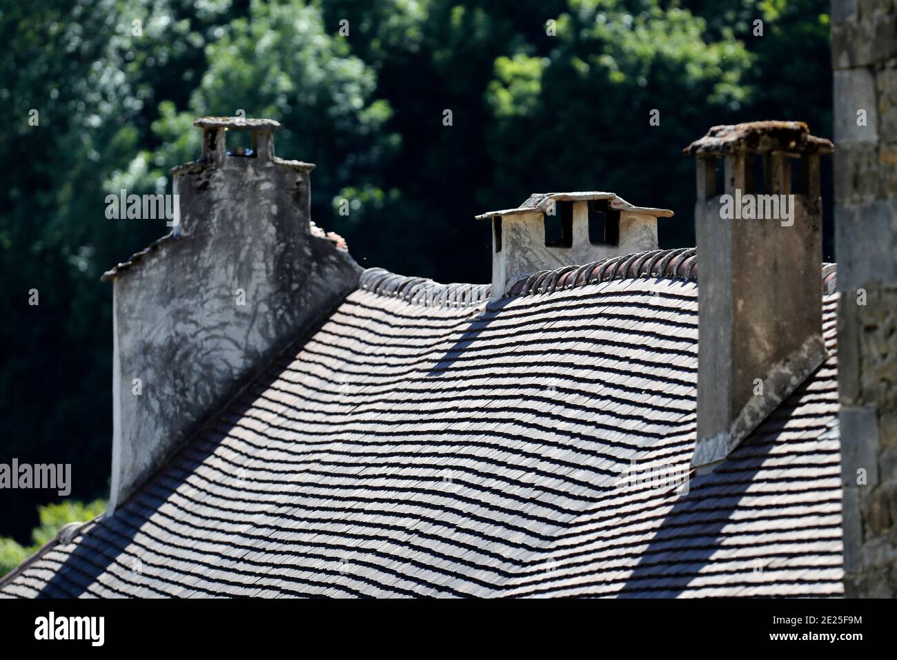 Old clay tile roof. Village of Beaume les Messieurs. France Stock Photo ...