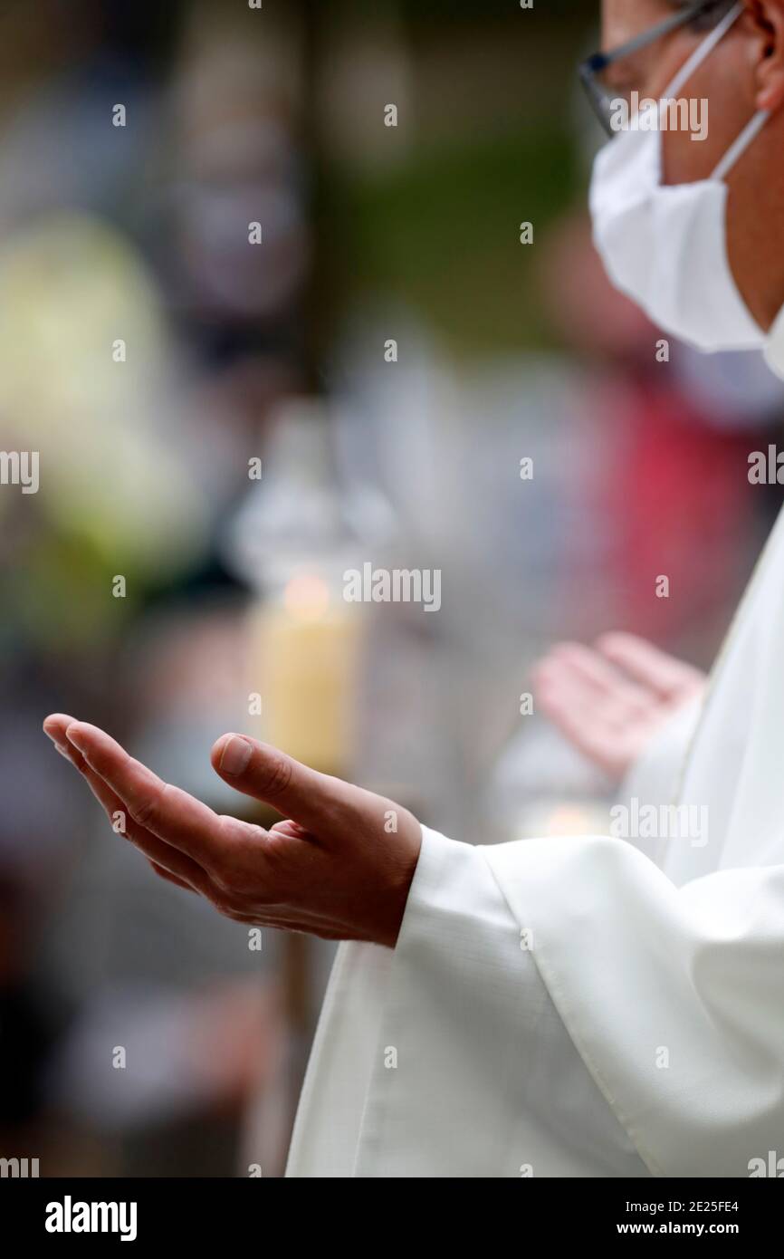 Catholic church during covid-19 epidemic. Celebration of the mass ...