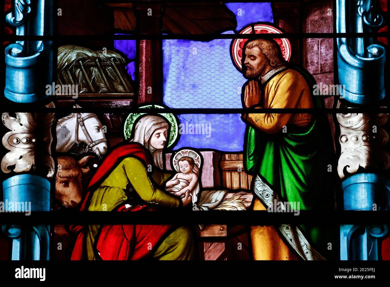 Stained glass window. Nativity of Jesus or birth of Christ. The ...