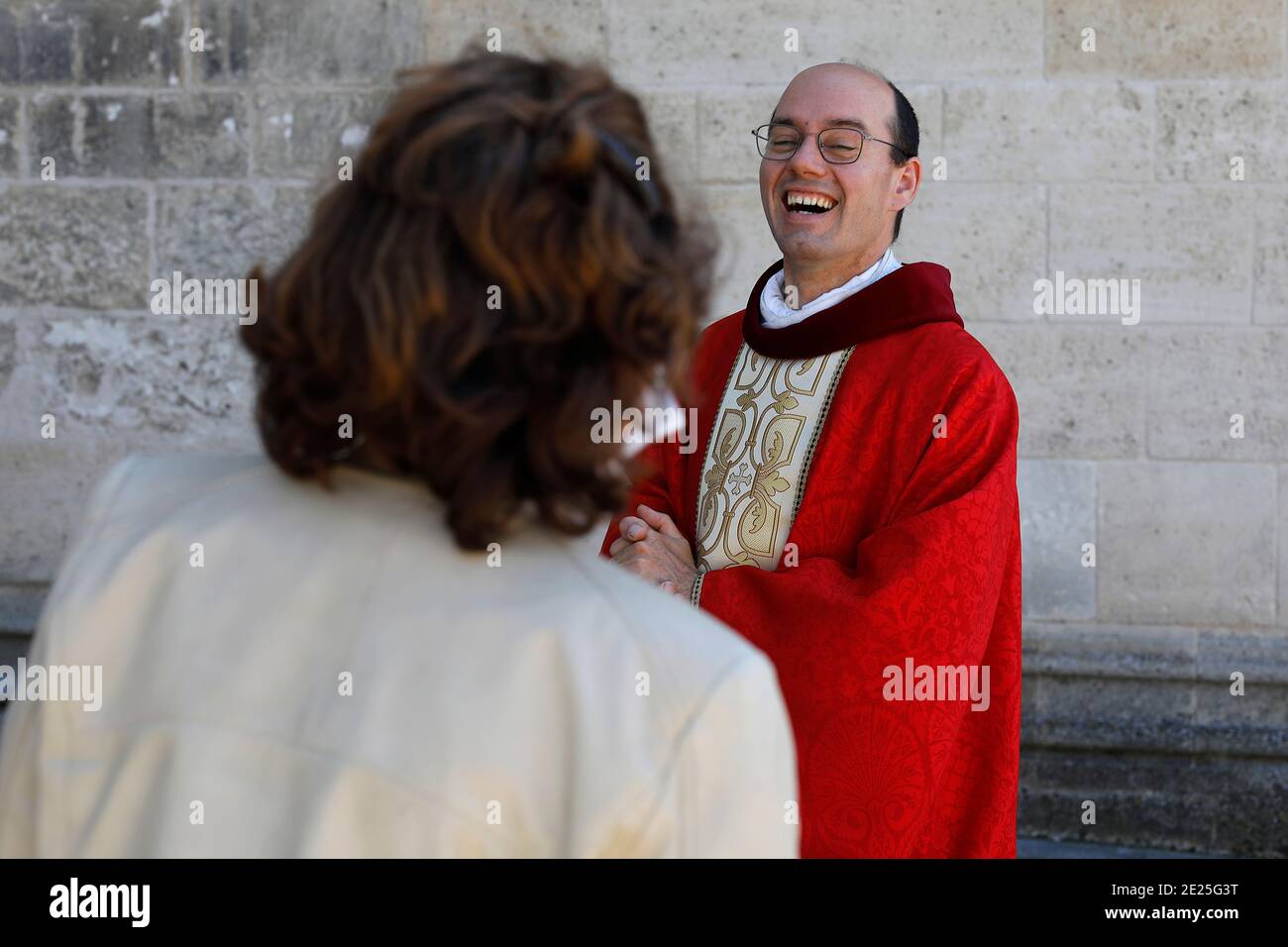 Catholic priest greeting parishioners after hi-res stock photography ...