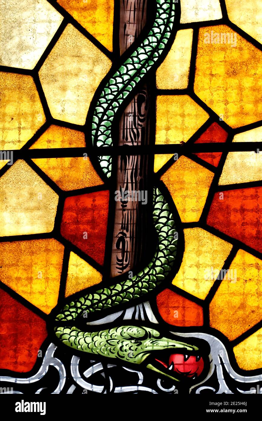 Notre Dame des Graces church. Stained glass window. The snake and the ...