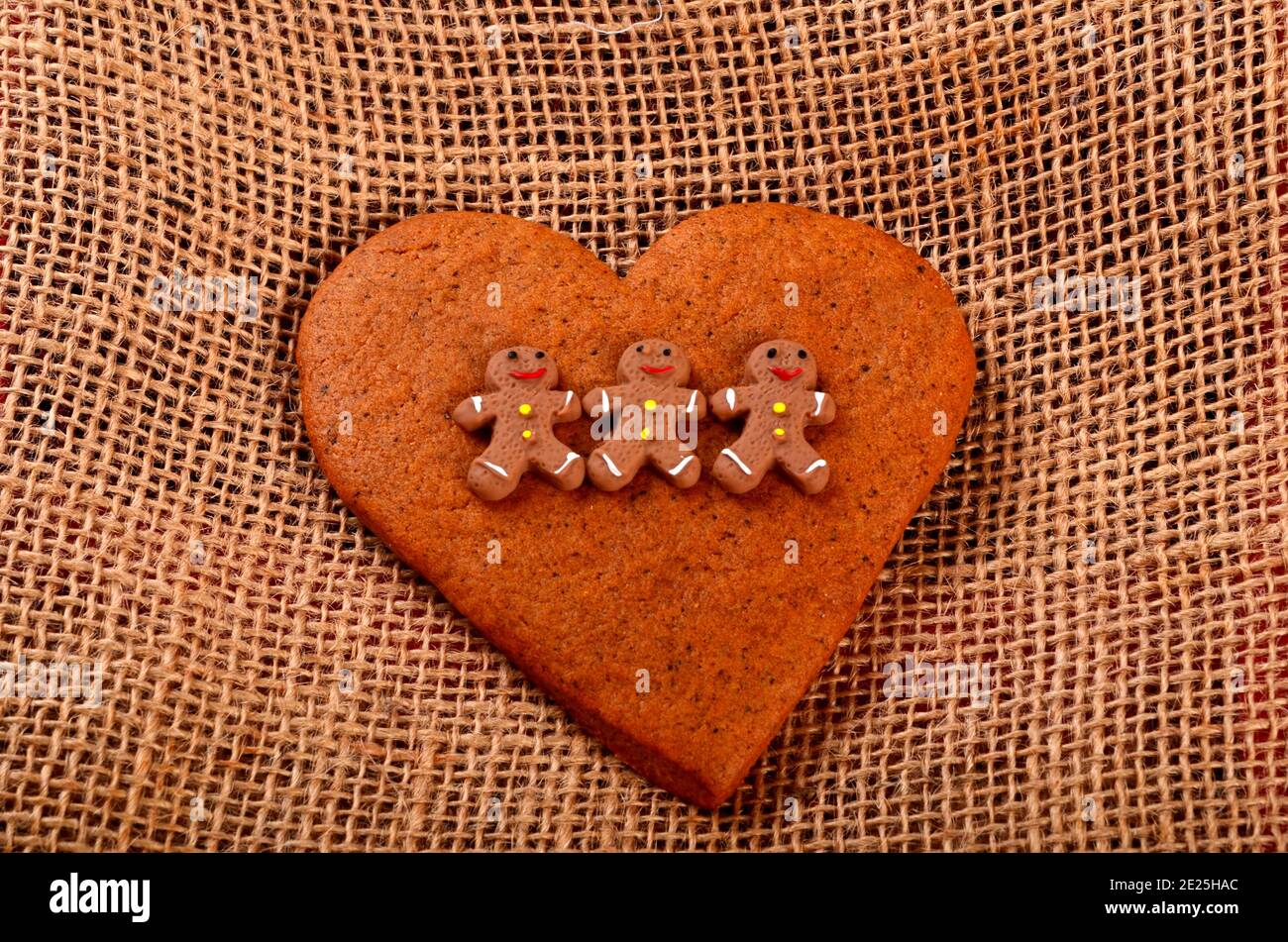 gingerbread hearts and Many Gingerbread men on a beige background ...