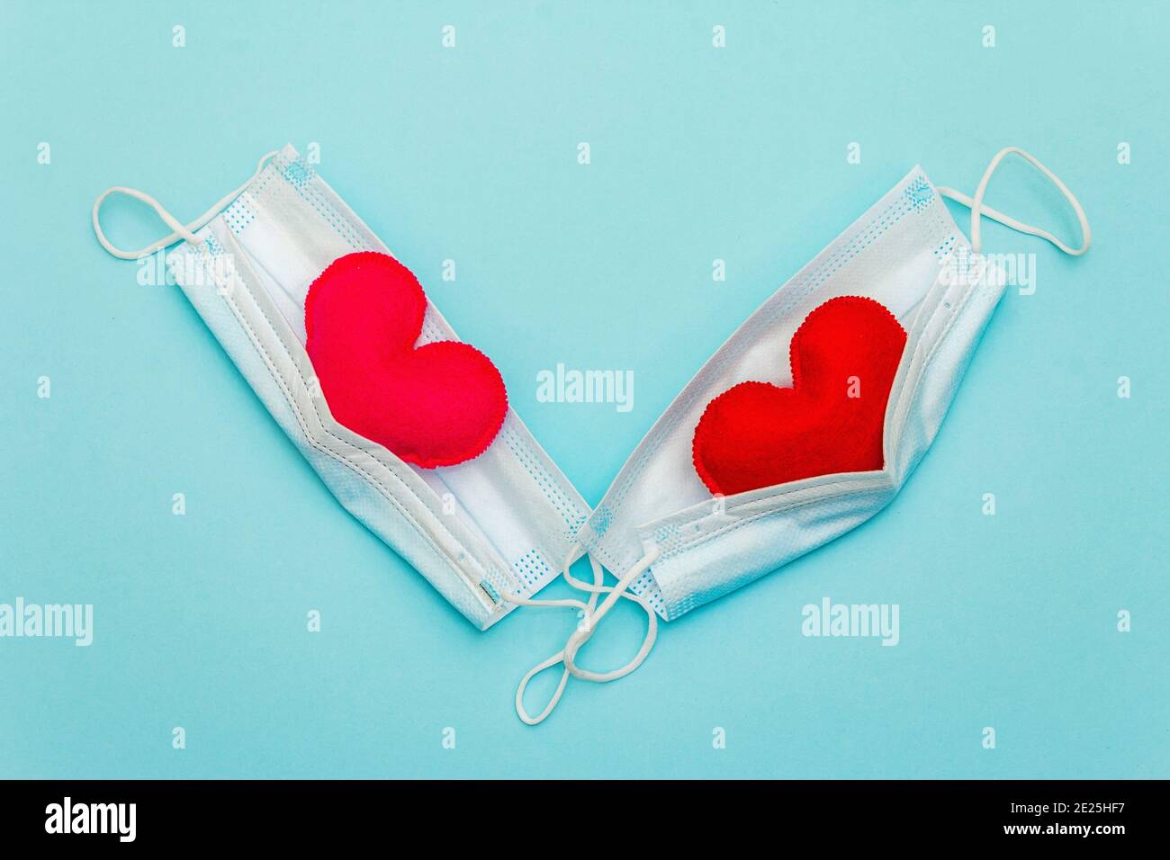 Blue medical mask hearts hi-res stock photography and images - Alamy