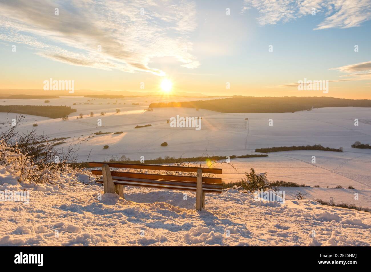 Scenic colourful sunset over beautiful winter landscape in the Swabian ...