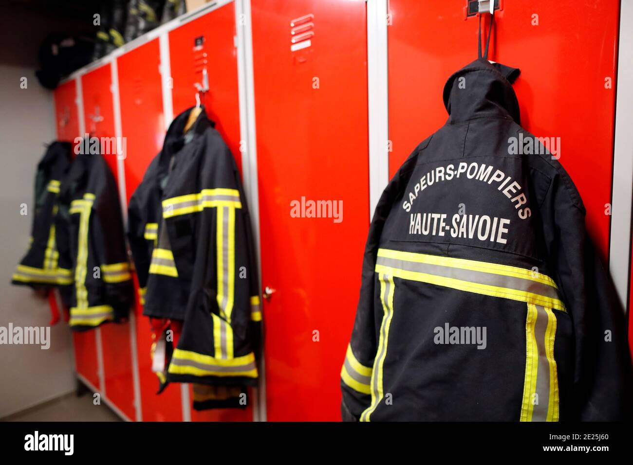 Fire department. Fireman coats wait for the next call. Locker room ...