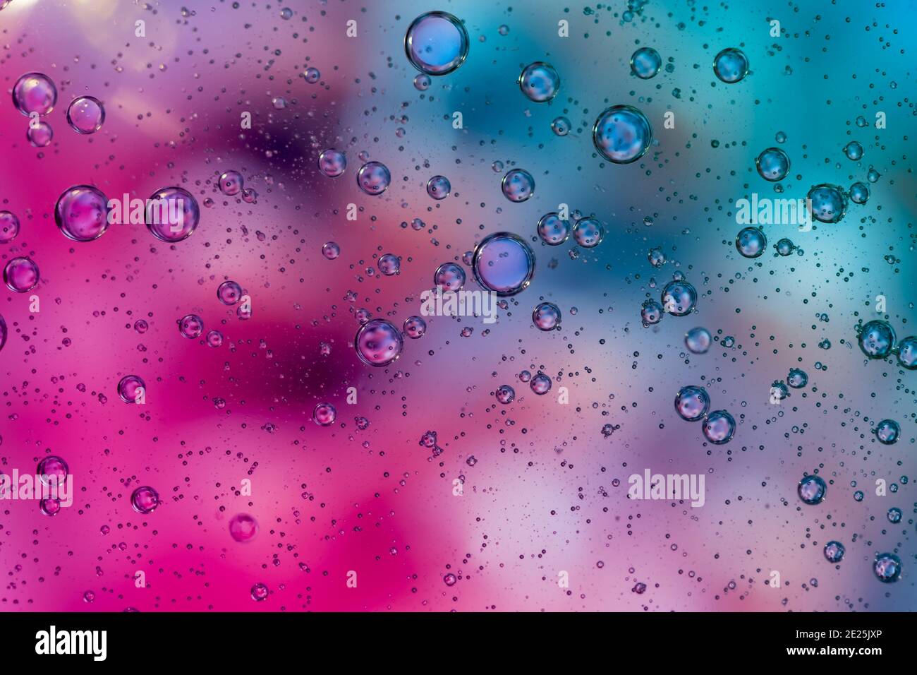 Colorful abstract macro background with oil drops in water Stock Photo ...