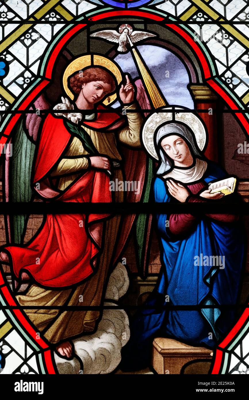 Saint Pierre church. Stained glass window. The Annunciation is the announcement by the angel ...