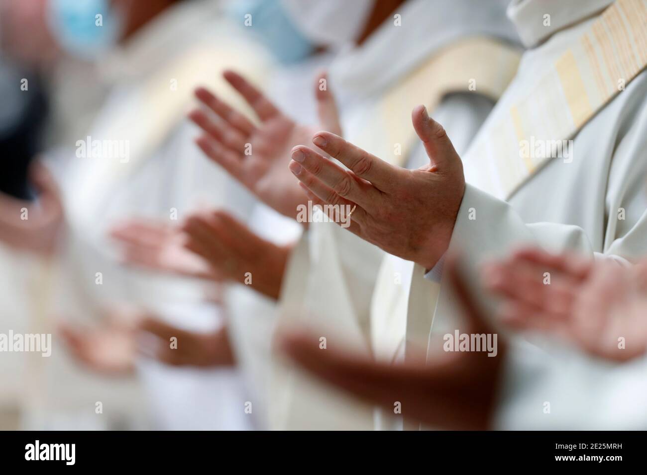Catholic priests hands hi-res stock photography and images - Alamy