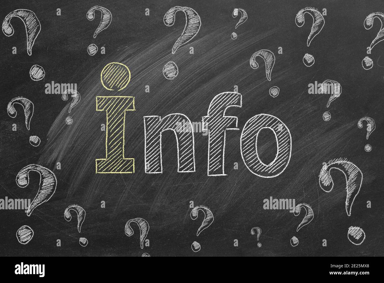 Lettering INFO and question marks drawn in chalk on a blackboard ...