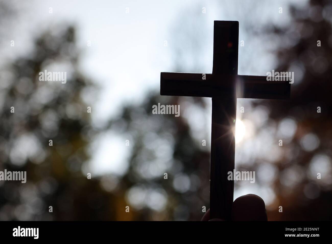 Christian wooden cross in hand. Faith and spirituality. France Stock ...