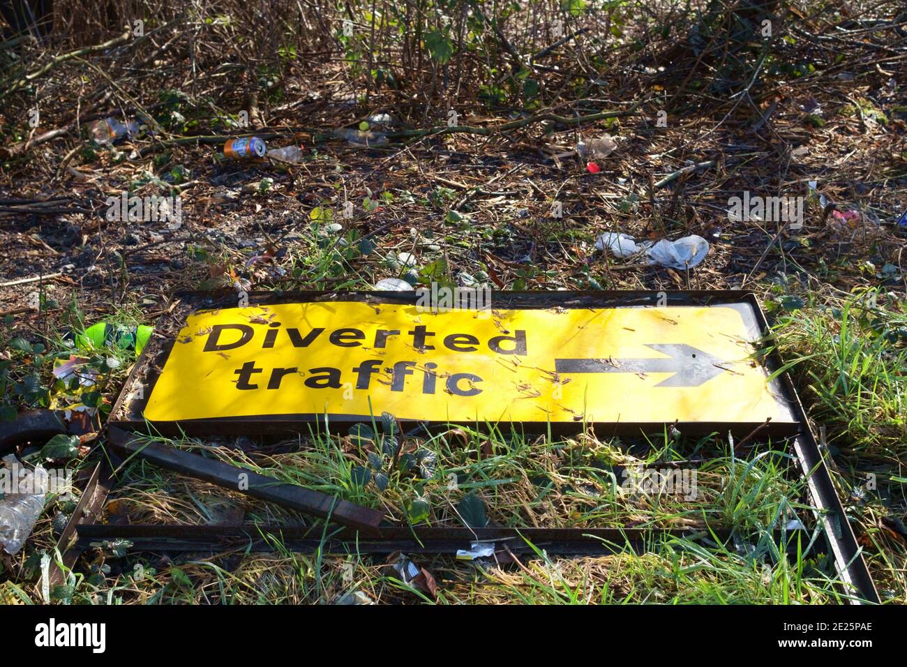 A lost and abandoned diverted traffic sign Stock Photo - Alamy