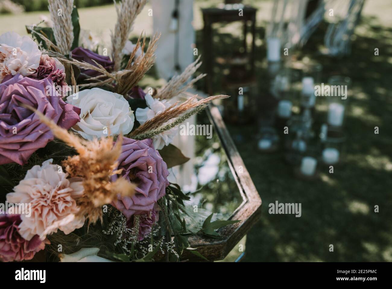 glass table with candles and chairs Stock Photo - Alamy