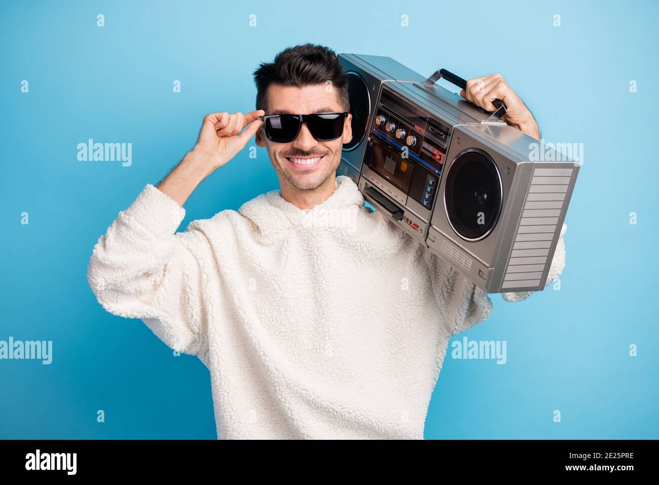 Young man boombox on shoulder hi-res stock photography and images - Alamy