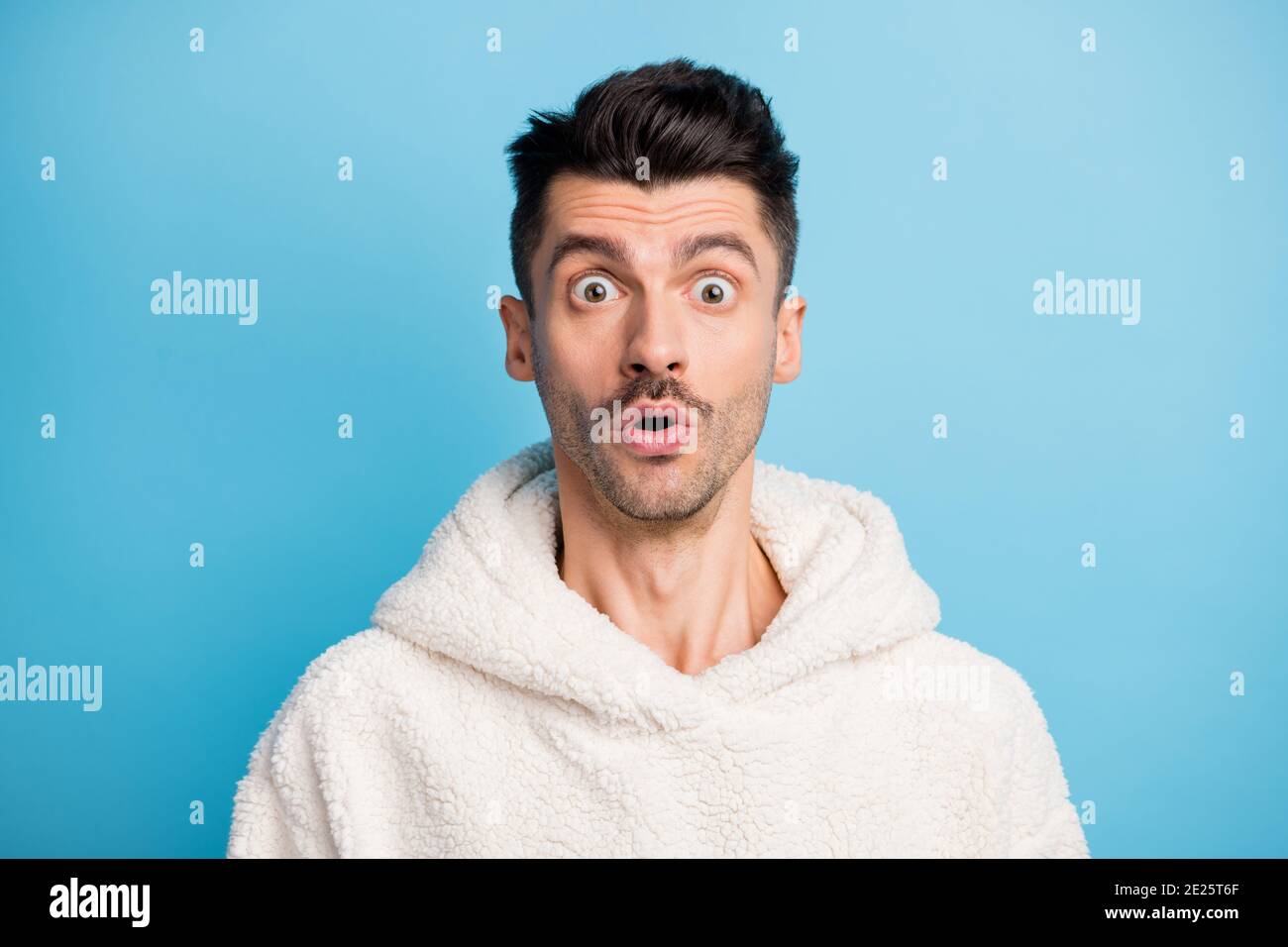 Photo portrait of amazed man with moustache isolated on pastel blue ...