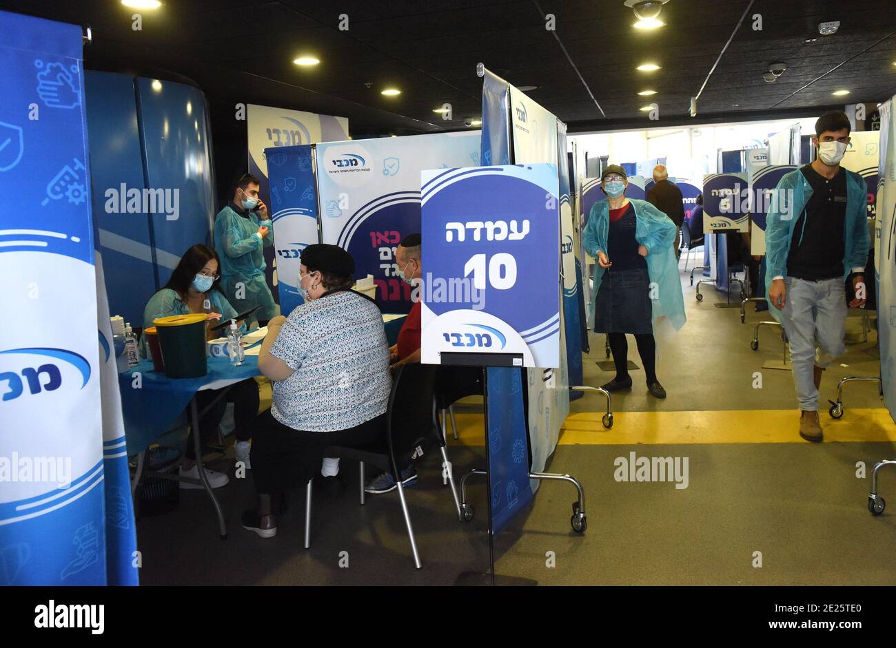 People receive their second shot of the Pfizer- BioNTech COVID-19 ...