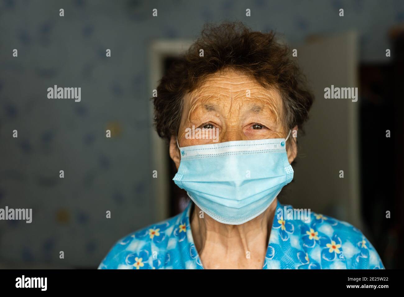 old patient wear surgical mask on white background, she admit in ...