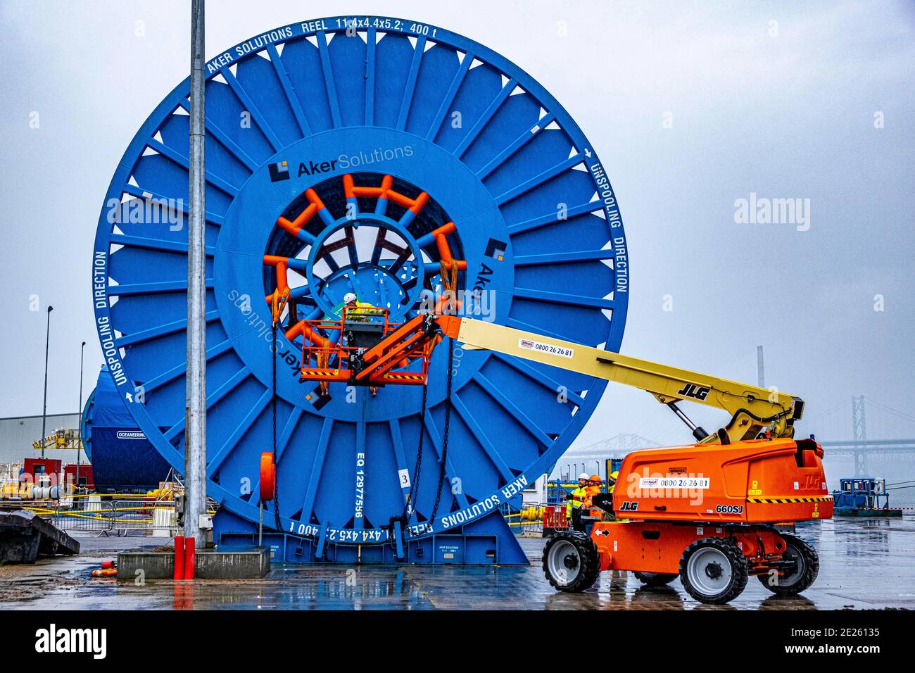 Large North Sea reels being unloaded at dockside Stock Photo - Alamy