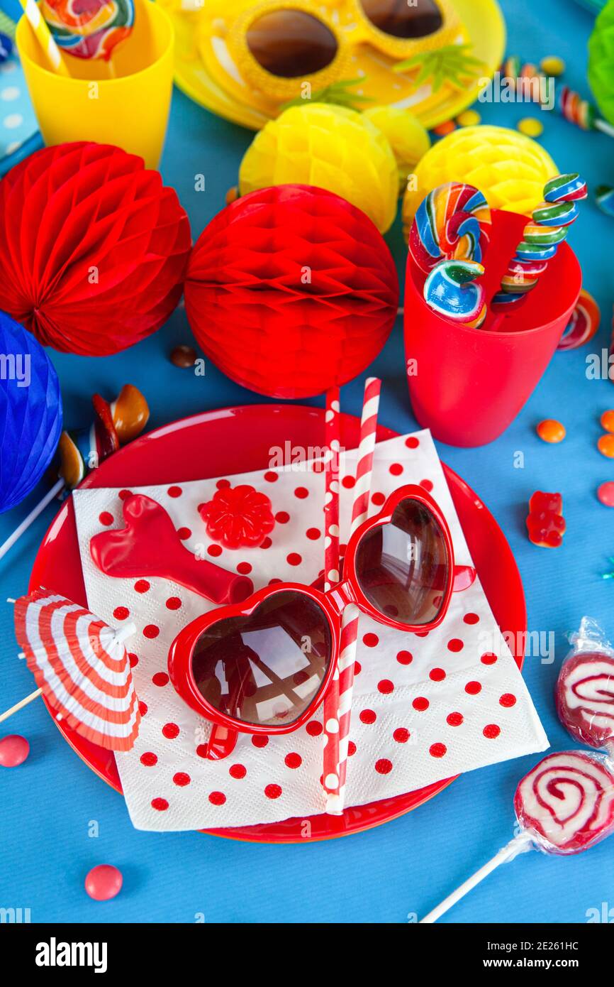 Colorful table setting with decorations for a party / kids birthday ...