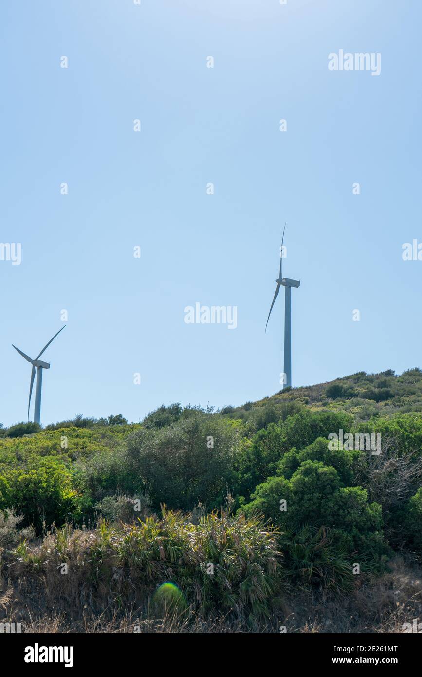 Frontal view of wind turbines in nature in sunshine Stock Photo - Alamy