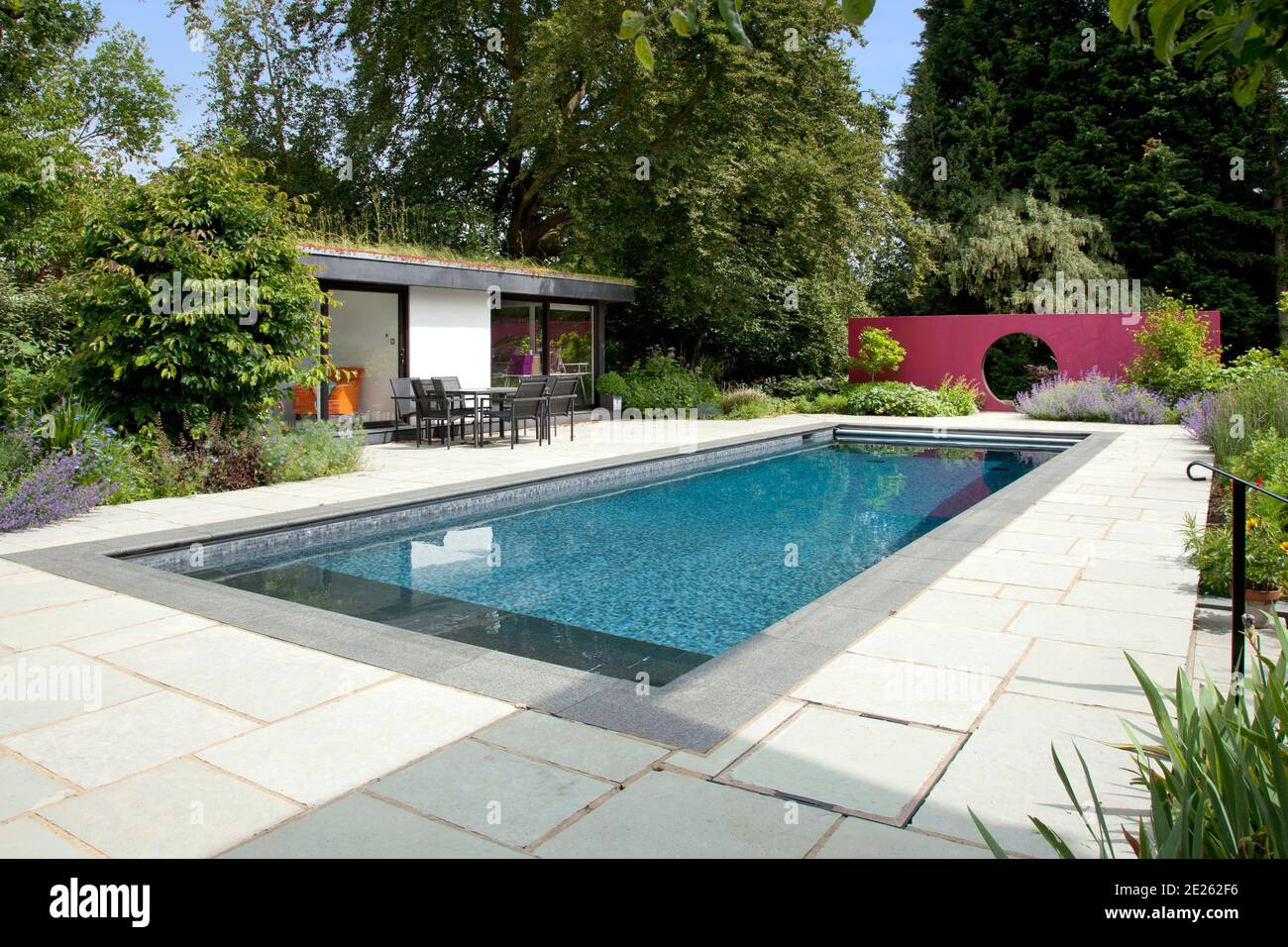 Contemporary private outdoor rectangular pool with garden room and ...