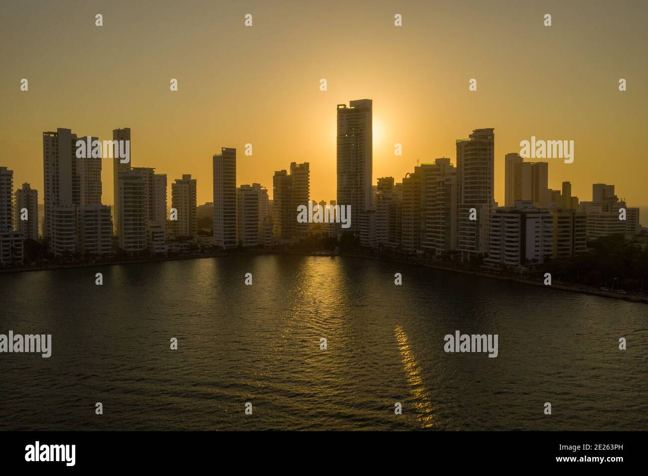 Miami Florida sunset with colorful illuminated business and residential ...