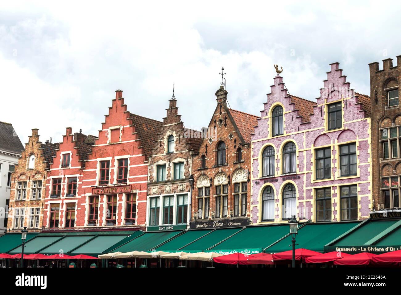Famous old colorful buildings at Market square in Bruges, Belgium ...