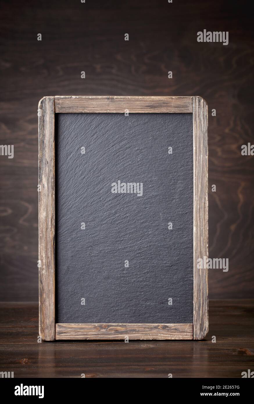 Empty slate menu blackboard on wooden wall with copy space Stock Photo ...