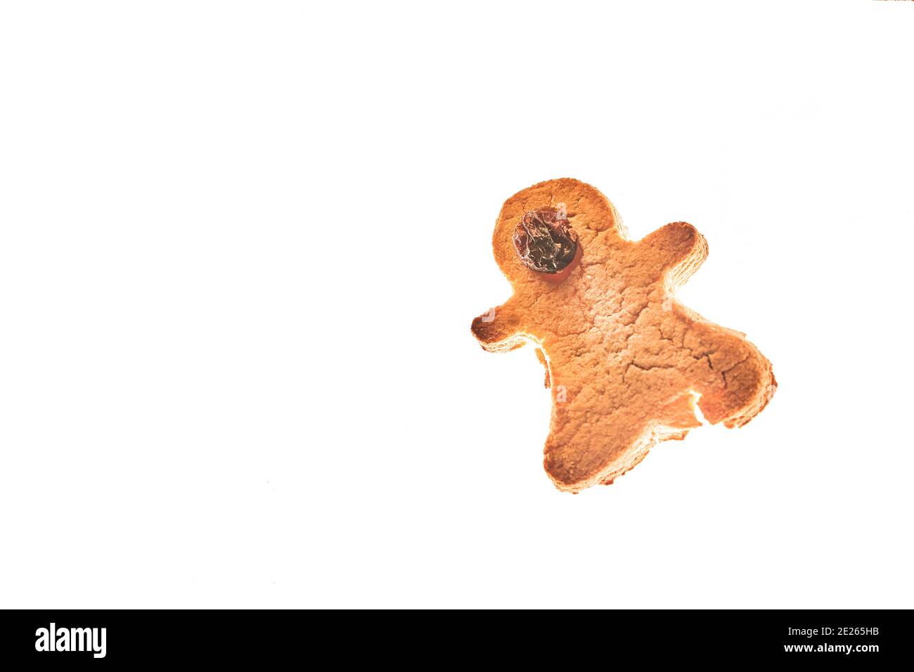 Gingerbread man on isolated white background with a raisin face. High ...