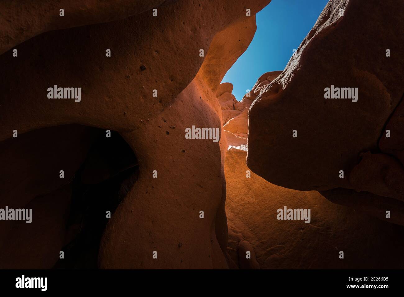 Beautiful narrow red stone canyon cave Stock Photo - Alamy
