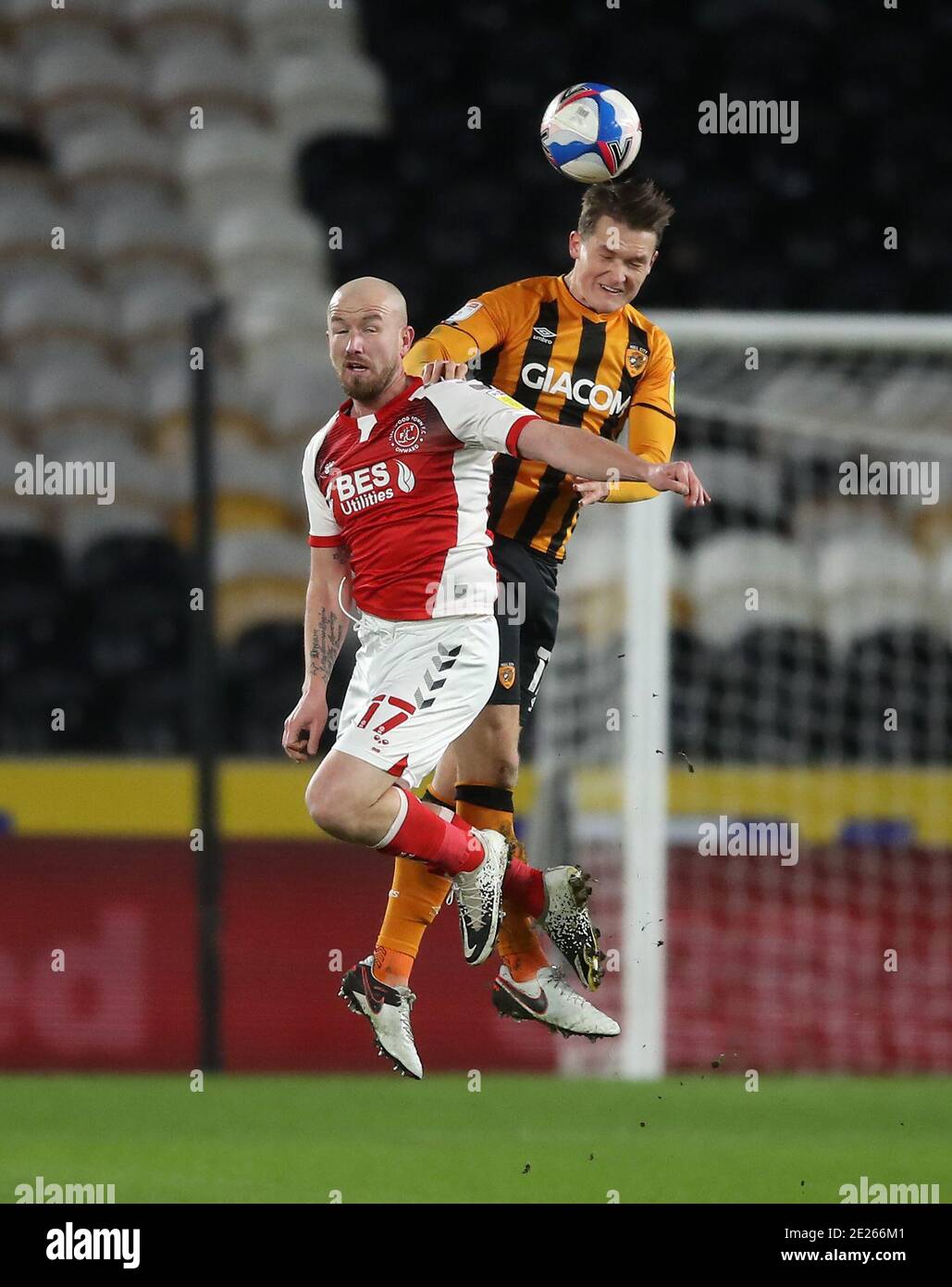 Hull City's Sean McLoughlin and Fleetwood Town's Paddy Madden battle ...
