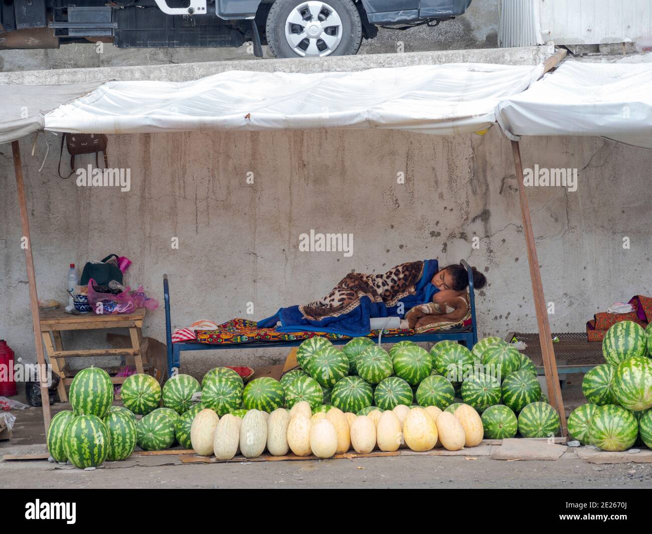 Selling of melons at road side. City Osh in the Fergana Valley close to ...
