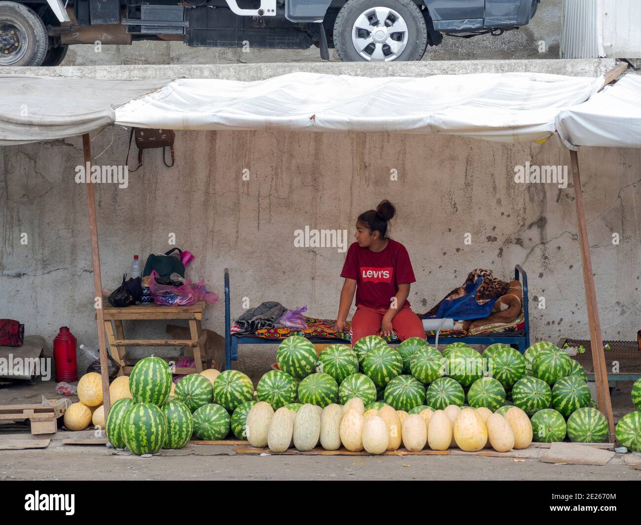 Selling of melons at road side. City Osh in the Fergana Valley close to ...