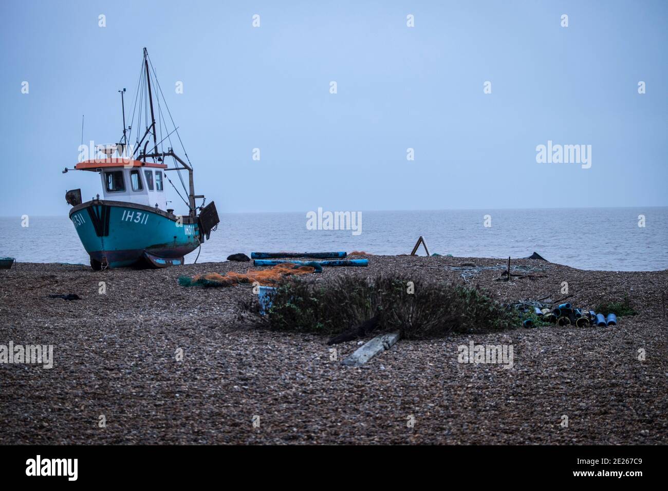 fishing boat on beach Stock Photo - Alamy