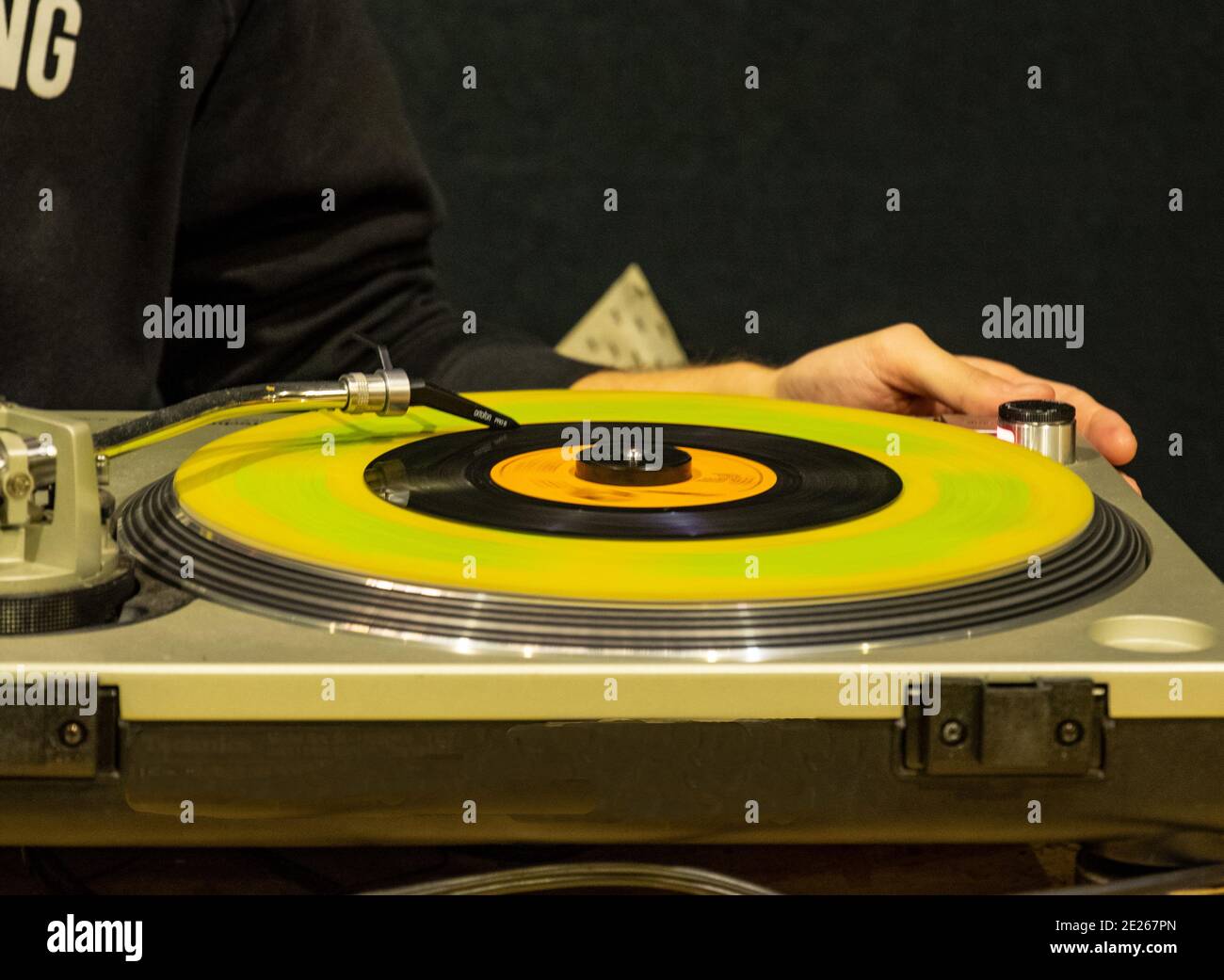 colorful disc jockey station while playing a disc Stock Photo - Alamy