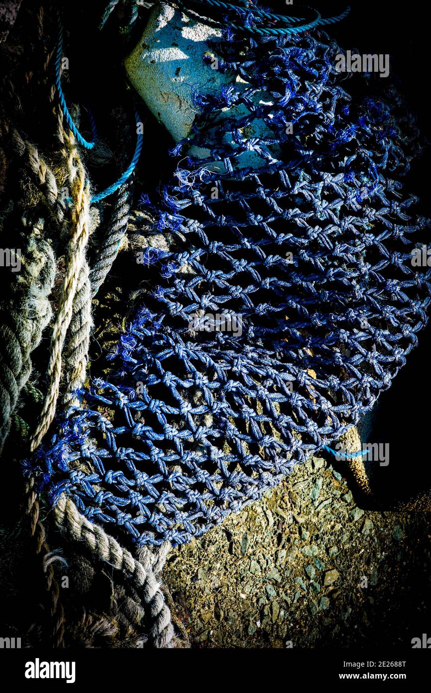 old fishing net and rope Stock Photo - Alamy