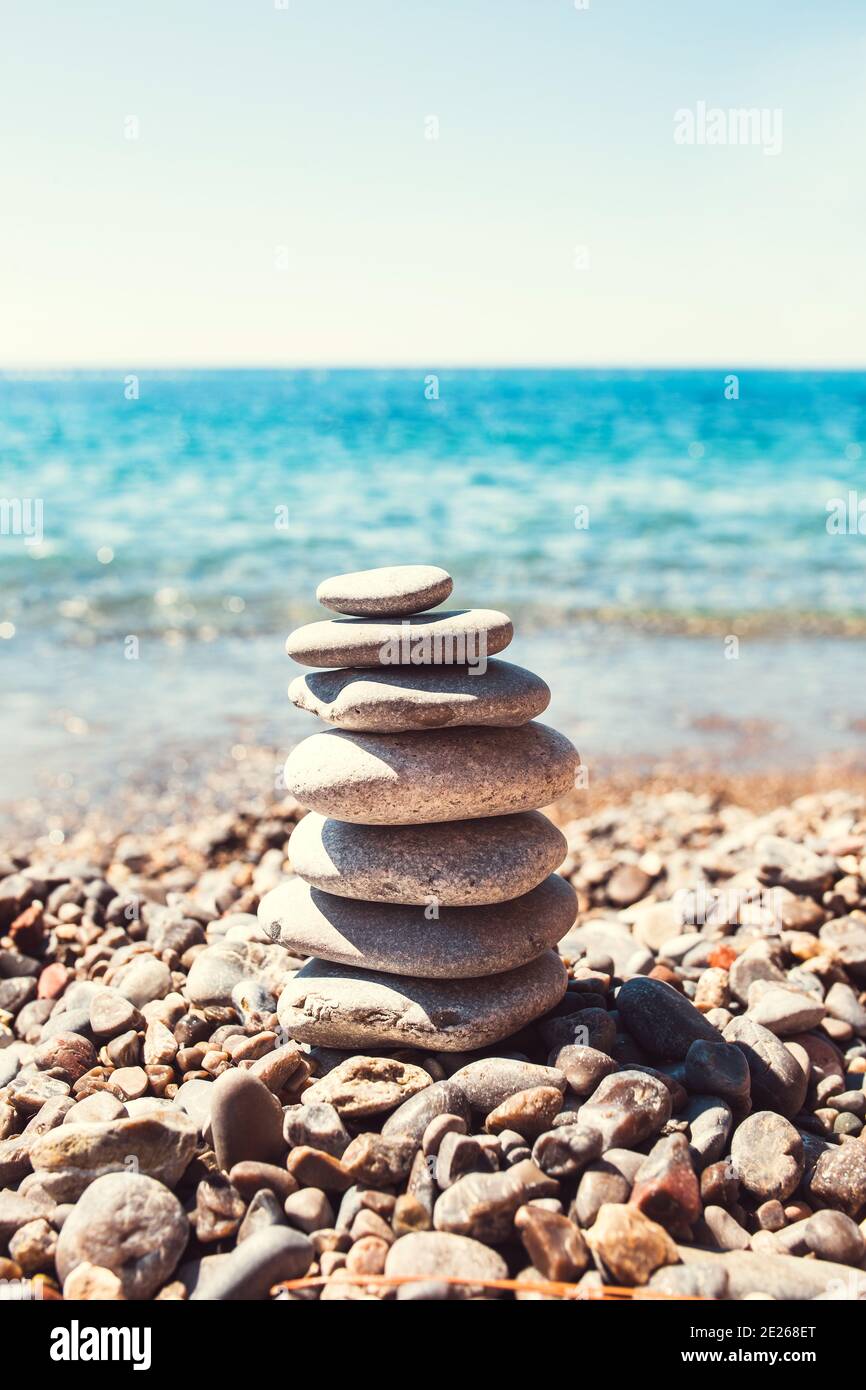 Smooth pebble stones on the shore of the island - peace and loneliness ...