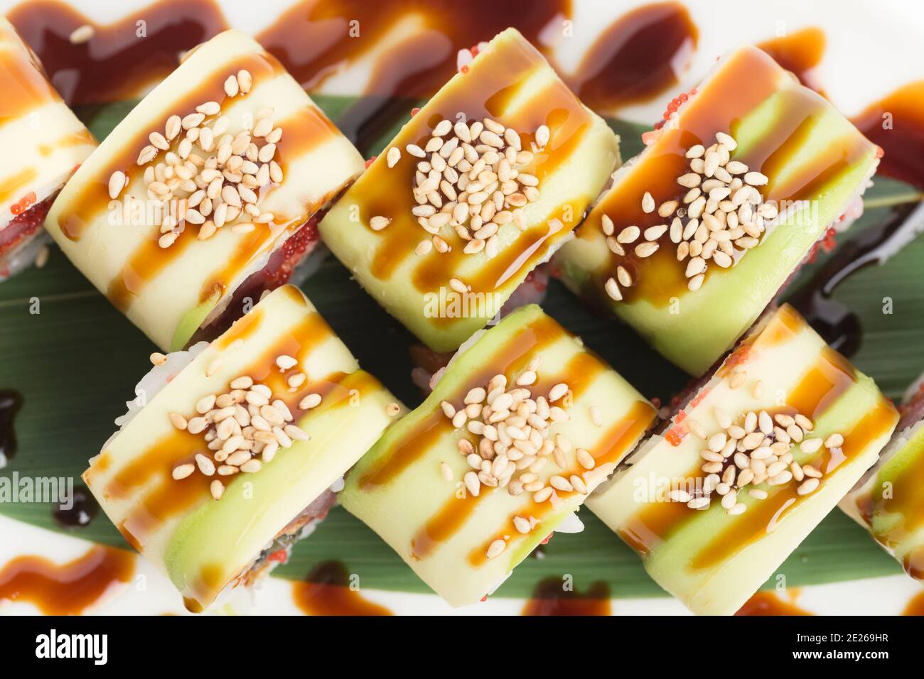 Original sushi roll fusion with various fillings. Close-up Stock Photo ...