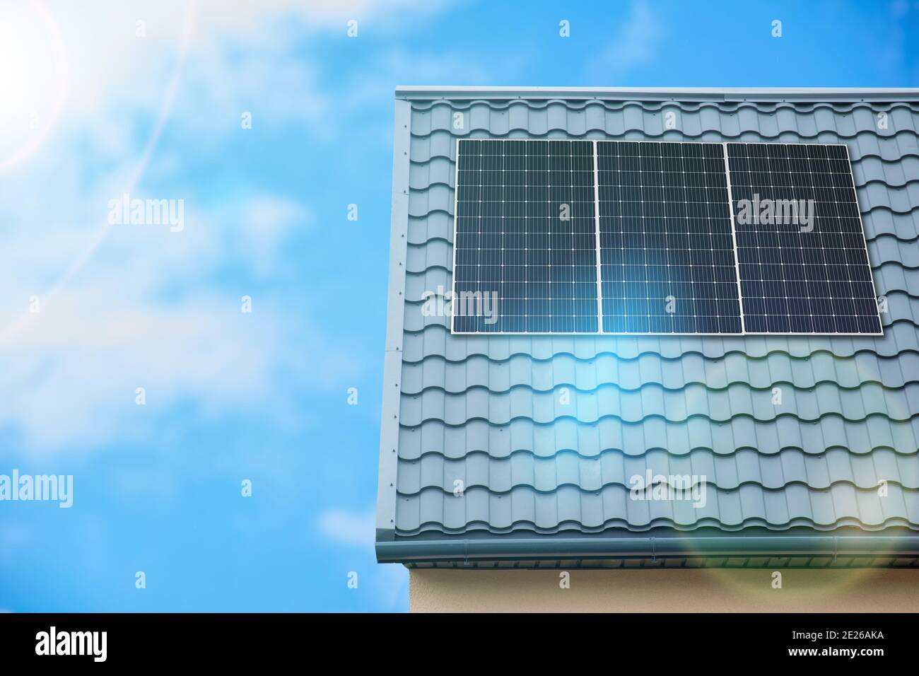 Solar cell panel on metal roof of house. Photovoltaic solar modules ...