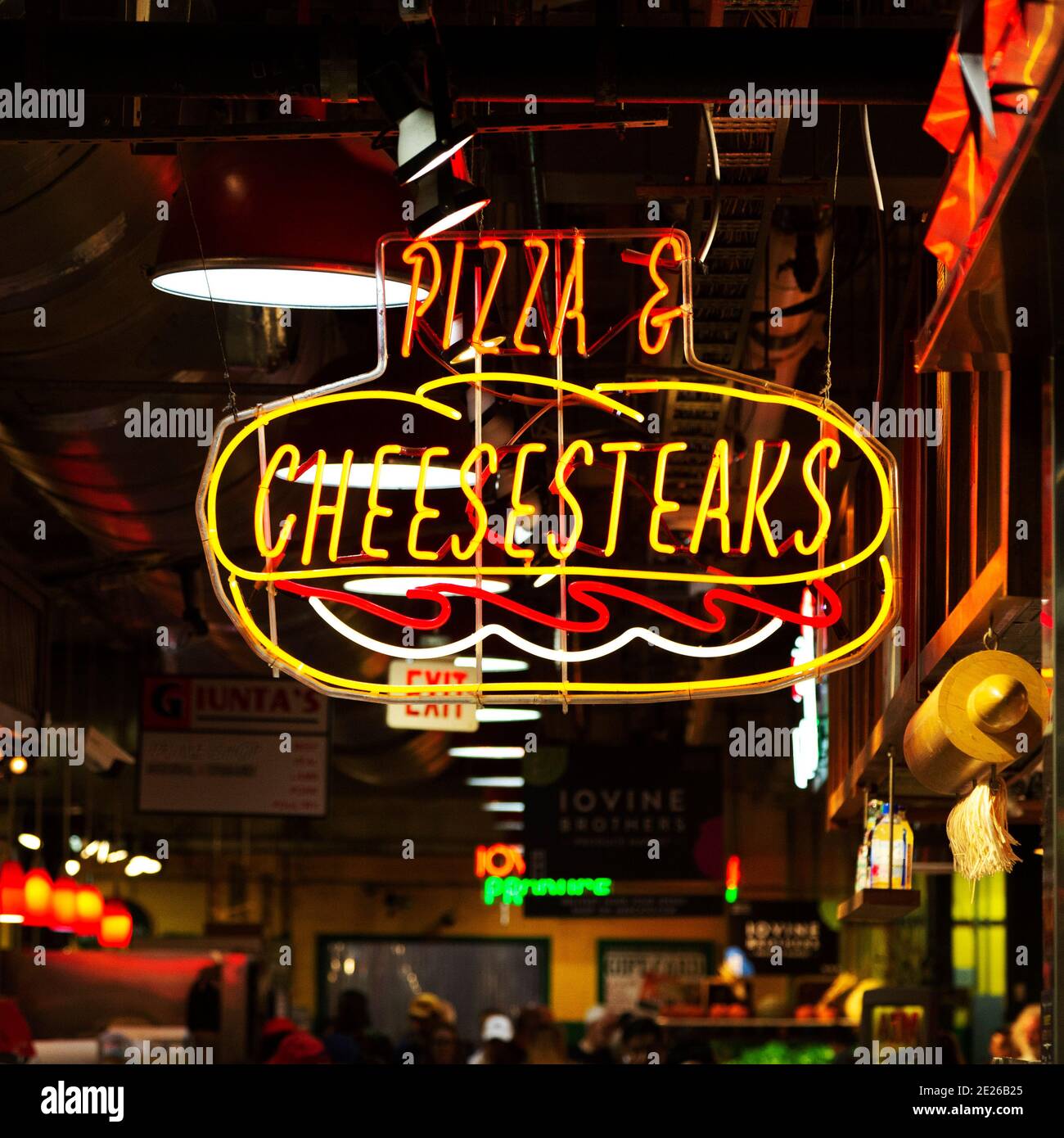 Neon sign for pizza and cheesesteaks at Reading Terminal Market in ...