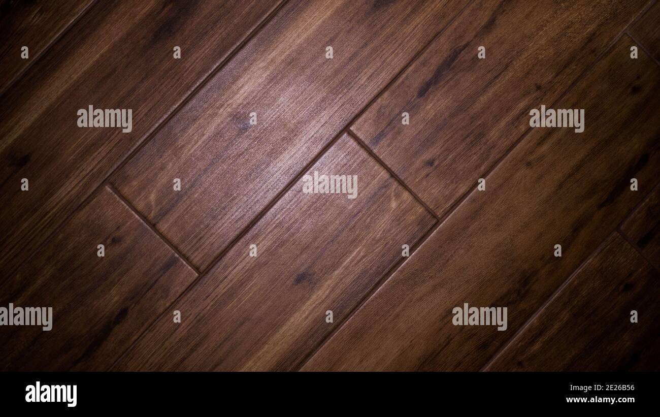 Tiled with wood texture, longitudinal tiles are laid on the floor ...